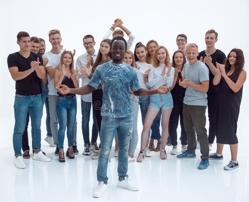Happy Guy Standing in Front of His Friends Team Stock Photo - Image of ...