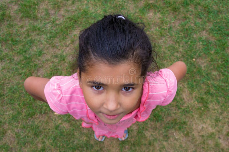 Happy Gypsy Child Girl Smiling, Shot from Above Perspective Stock Image ... Happy Gypsy Child Girl Smiling, Shot from Above Perspective Stock Image ...