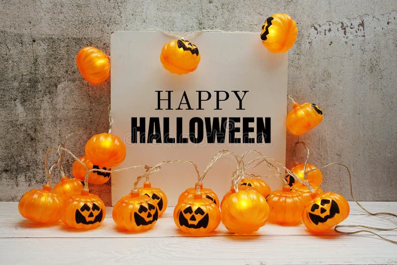 Happy Halloween Text Message with LED Halloween Pumpkin on Wooden ...