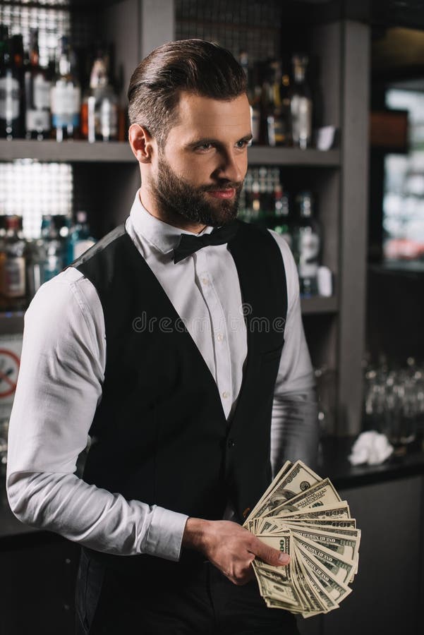 Handsome Bartender Leaning on Bar Counter and Looking Stock Image ...