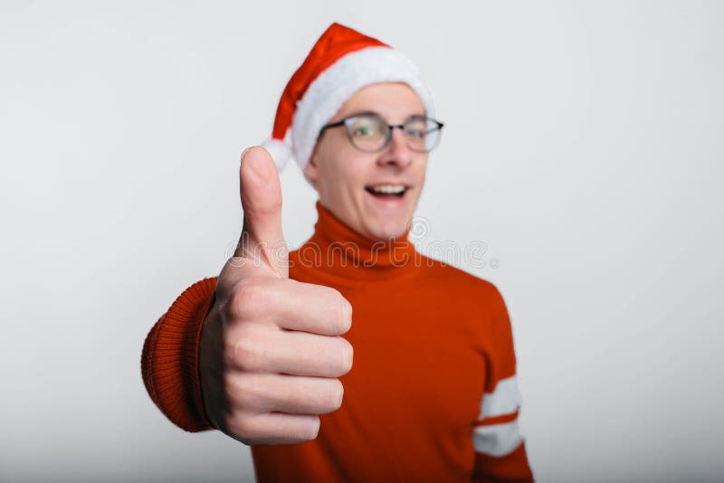 Happy Handsome Man in Christmas Hat Showing Thumbs Up Stock Image ...