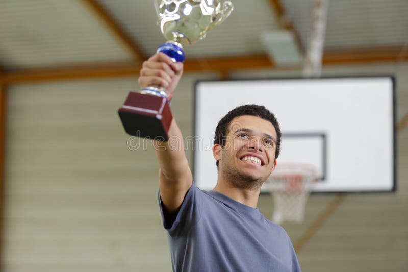 Happy Handsome Man Holding Trophy Stock Photo - Image of happiness ...