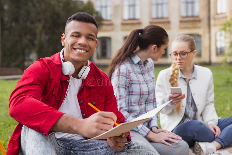 Student is Busy Writing in Her Textbook Stock Photo - Image of school ...