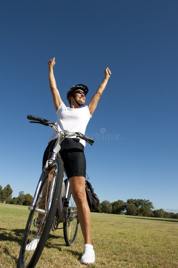 Happy Healthy Female Cyclist Stock Image - Image of athlete, aged: 22838241