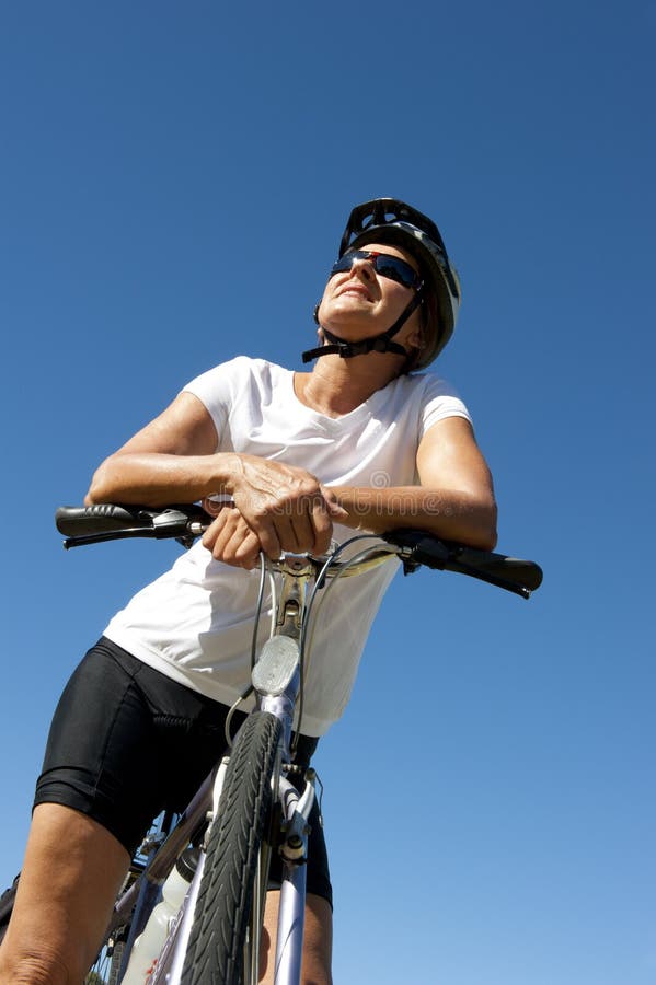 Happy Healthy Female Cyclist Stock Image - Image of athlete, bike: 22838257