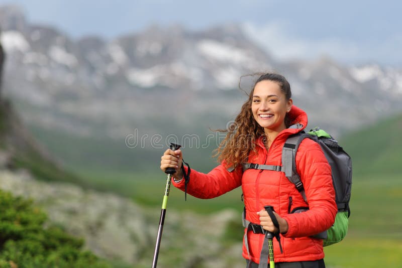 Happy Hiker in Red Looking at Camera in the Mountain Stock Photo ...