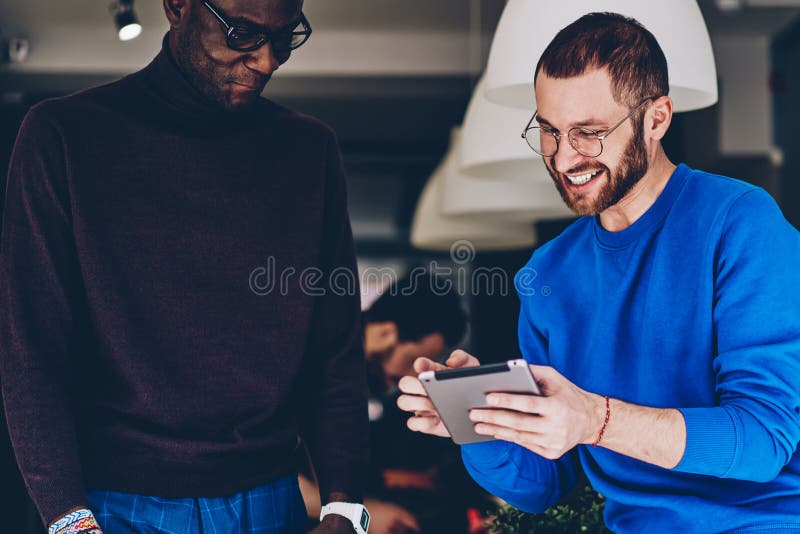 Happy Hipster Guys Satisfied with App for Booking on Touchpad ...