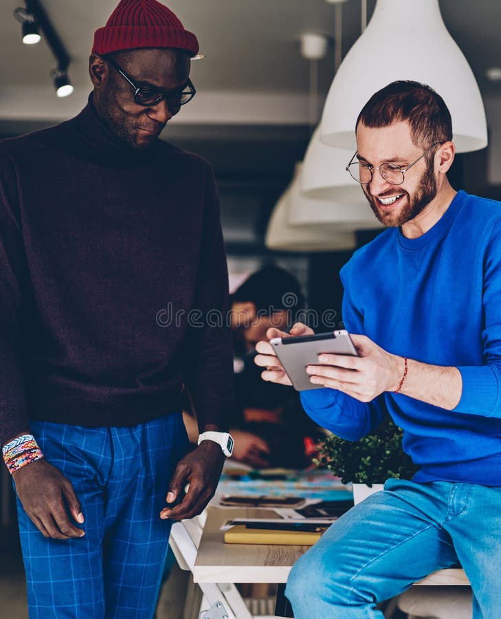 Happy Hipster Guys Satisfied with App for Booking on Touchpad ...