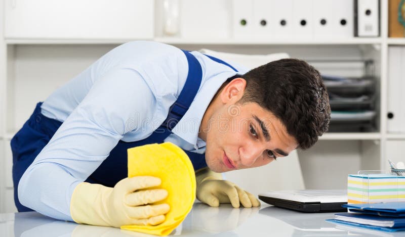 Happy House Worker is Cleaning Dust from the Desk Stock Image - Image ...