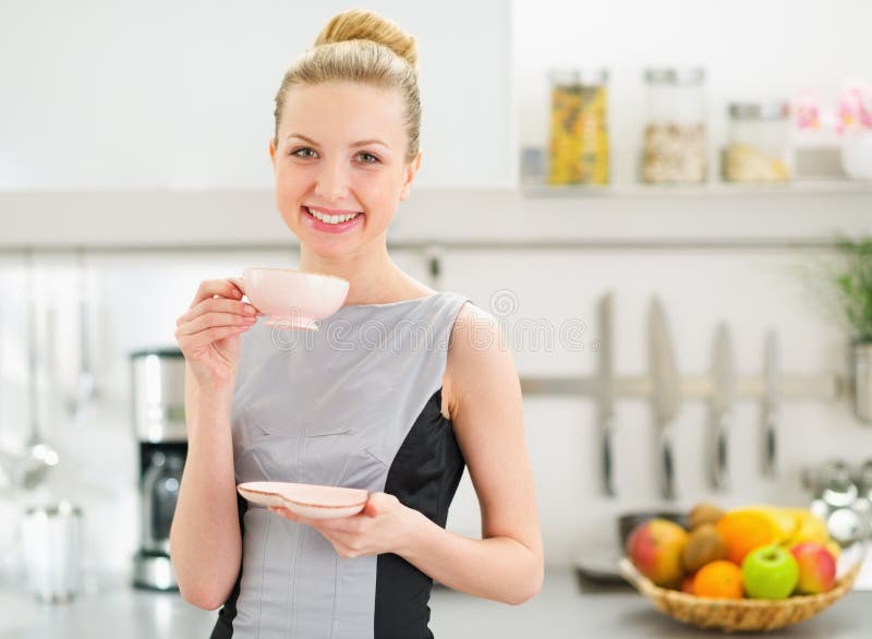 Happy Housewife Drinking Tea in Modern Kitchen Stock Photo - Image of ...