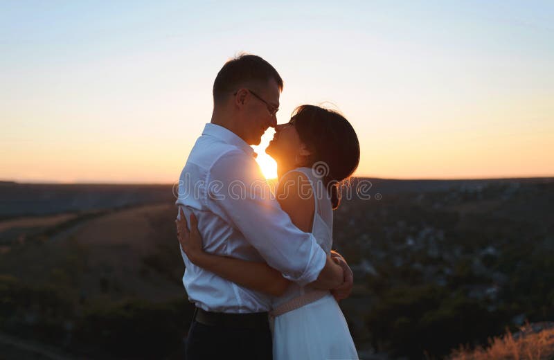 Happy Hugging Couple at Sunset Stock Image - Image of outdoor ...