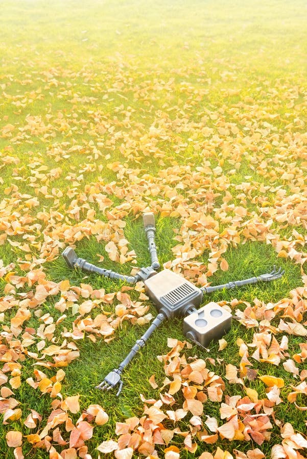 Happy Humanoid Robot Lies on the Autumn Grass Stock Image - Image of ...