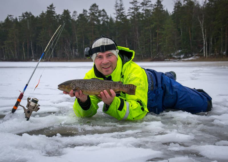Happy Angler Fishing on the Ice Stock Photo - Image of line, enjoy ...