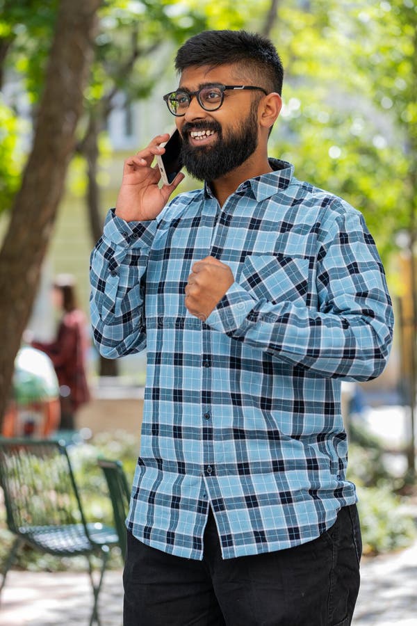 Happy Indian Man Having Remote Conversation Talking on Smartphone, Good ...