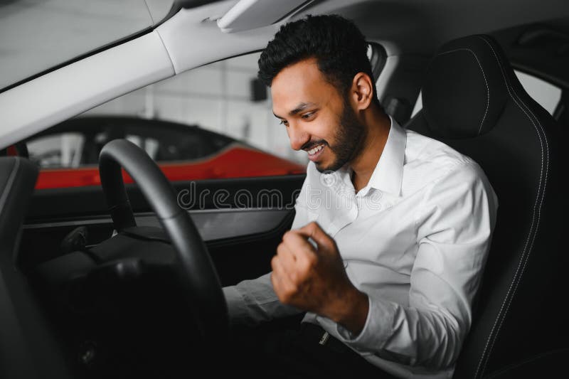 Happy Indian Man Checking Car Features at Showroom Stock Image - Image ...