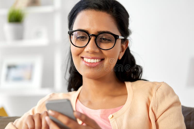 Happy Indian Woman Using Smartphone at Home Stock Image - Image of ...