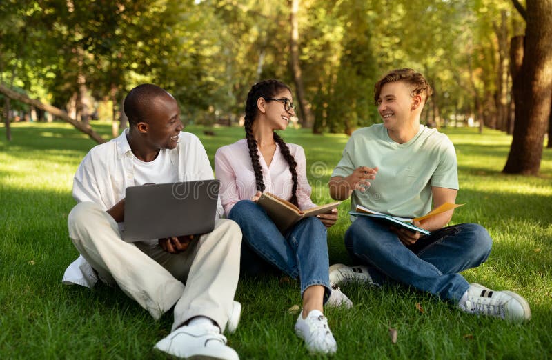 Happy International Students Resting in College Campus, Sitting on ...