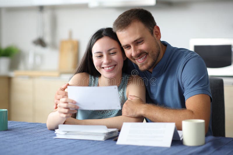 Happy Interracial Couple Reading Bill at Home Stock Image - Image of ...