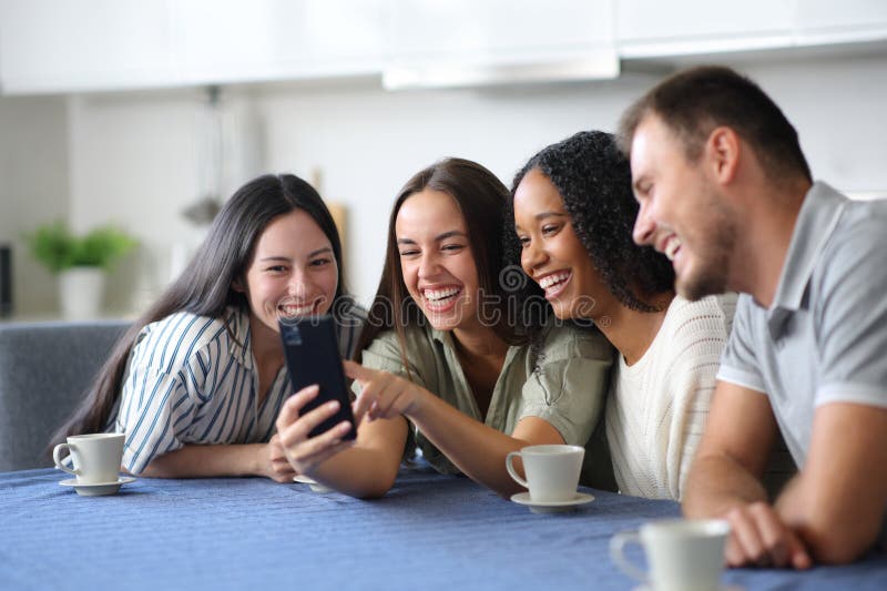 Happy Interracial Group of Friends Using Phone Stock Photo - Image of ...