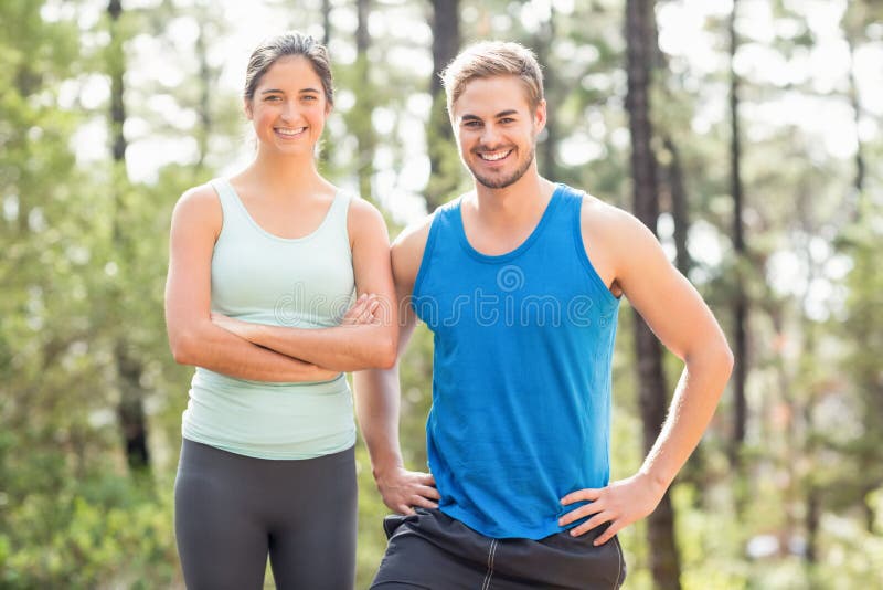 Happy Joggers Looking at Camera Stock Image - Image of female, nature ...