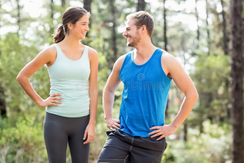 Happy Joggers Looking at Each Other Stock Photo - Image of activities ...