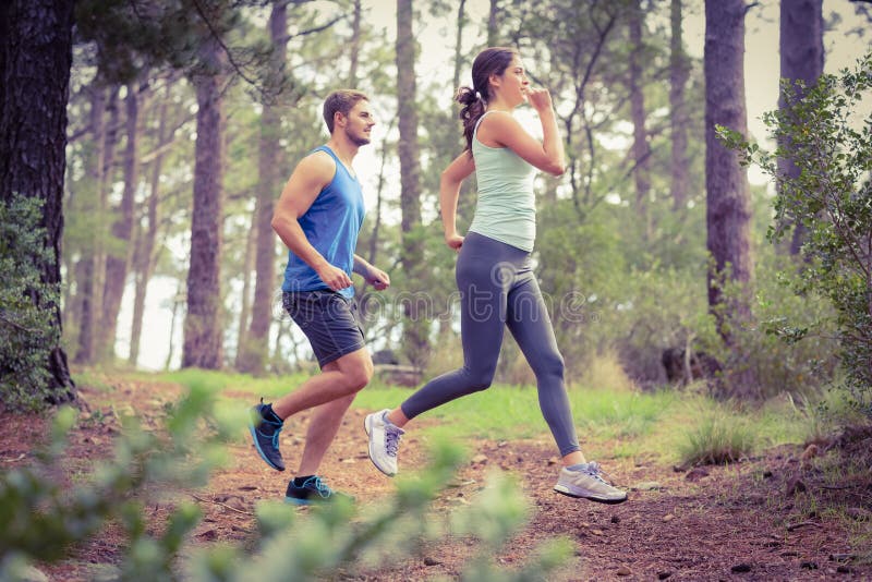Happy joggers running stock image. Image of exercises - 58191803