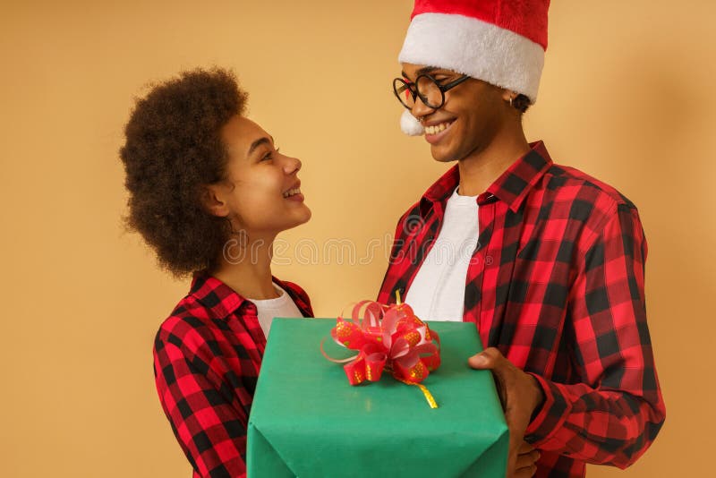 Happy and Joyful Couple Exchange Christmas Present Stock Image - Image ...