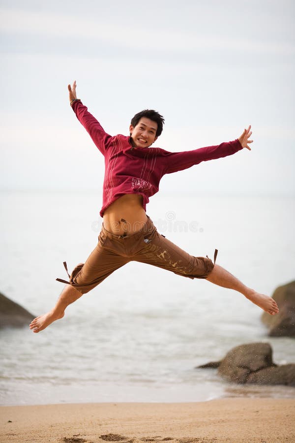 Happy jump stock image. Image of hair, adult, sand, young - 3060851