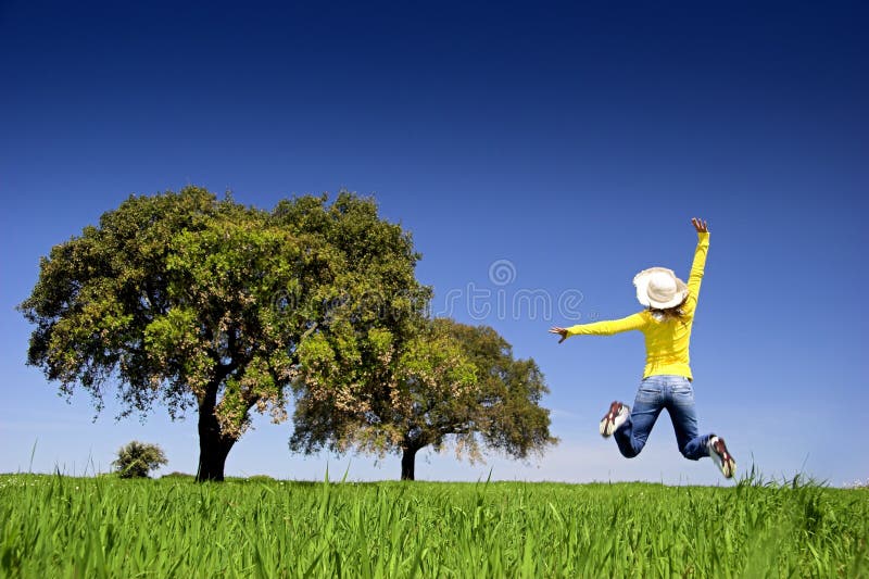 Happy Jump stock image. Image of high, nature, grass, girl - 5685275