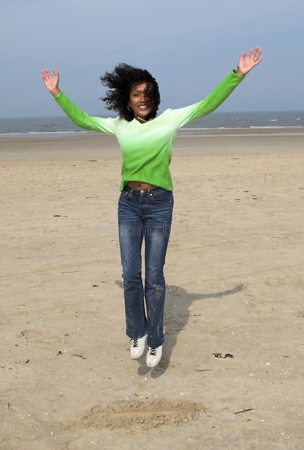 Happy jump stock photo. Image of diversity, curls, lifestyle - 922982
