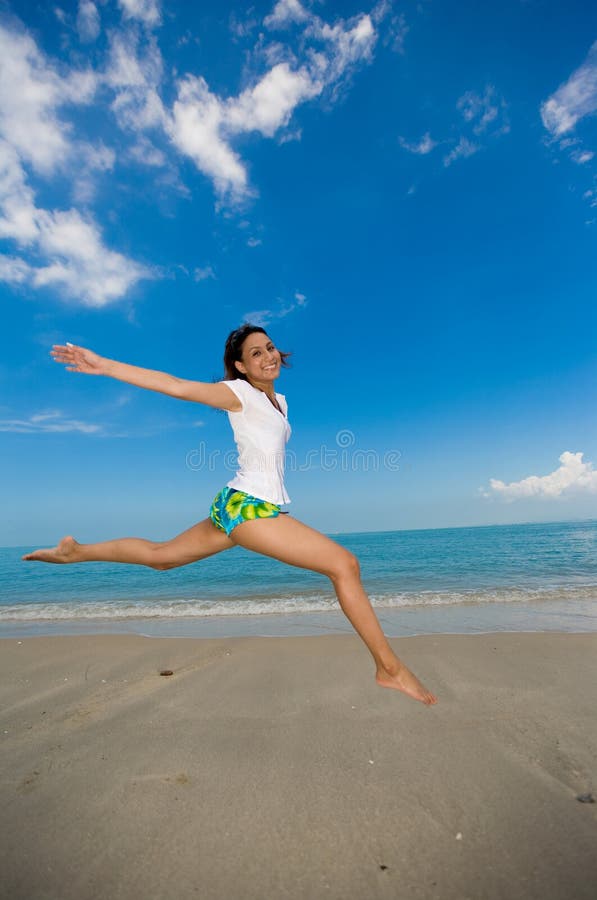 Happy Jump At The Beach Picture. Image: 3695928
