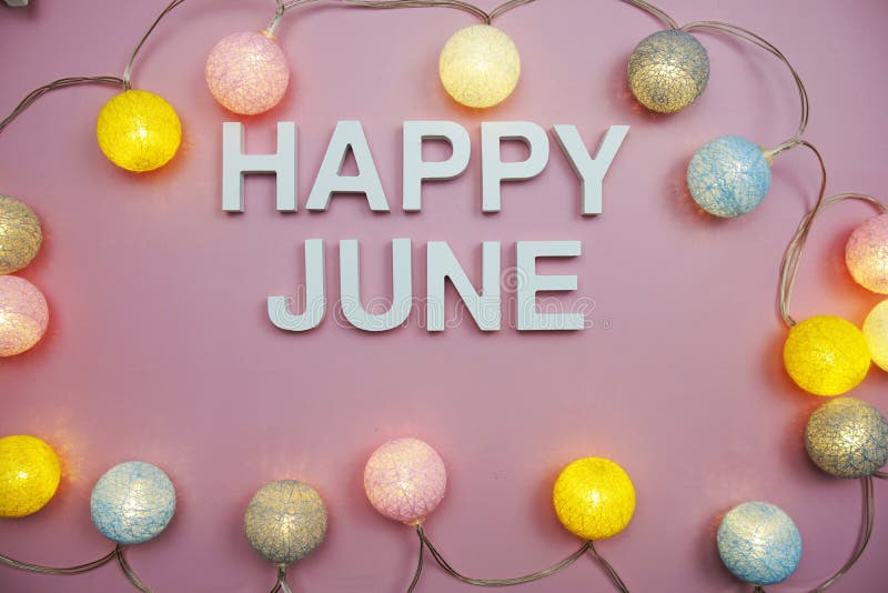 Happy June Alphabet Letters with Flowers Frame on Wooden Background ...
