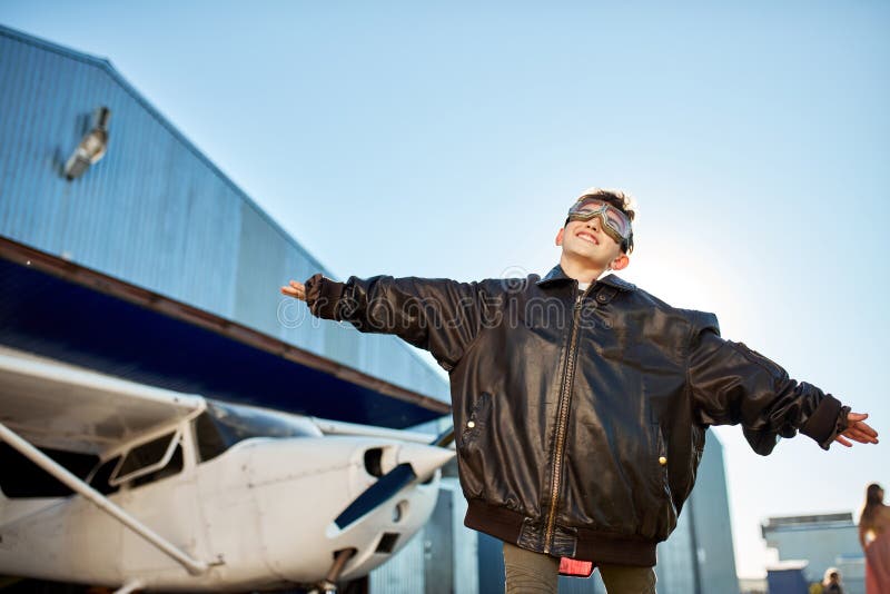 Happy Kid in Aviator Glasses Playing in Front of White Light Private ...