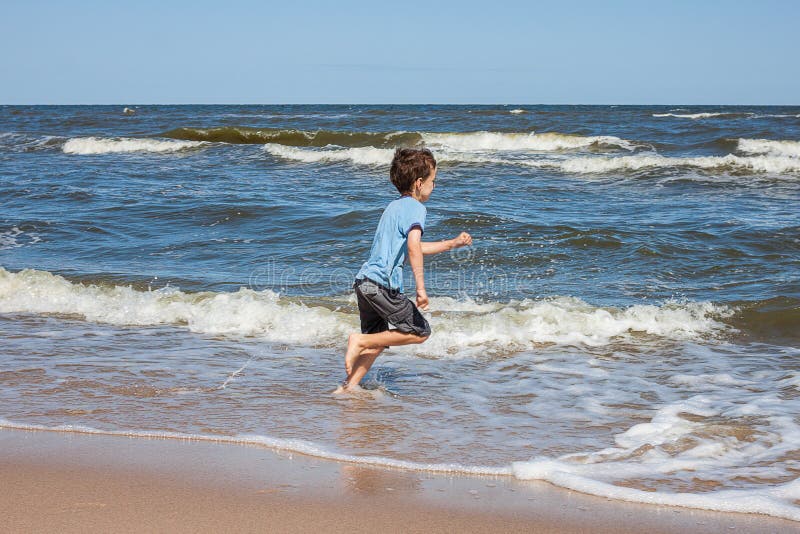 Happy kid on a beach stock photo. Image of summer, carelessness - 39732958