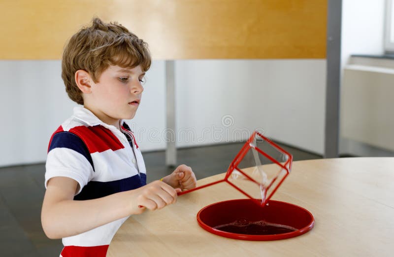 Happy Kid Boy Having Fun with Building and Creating Geometric Figures ...