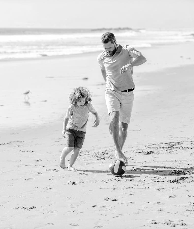 Happy Kid and Dad Running on Beach in Summer Vacation with Ball ...