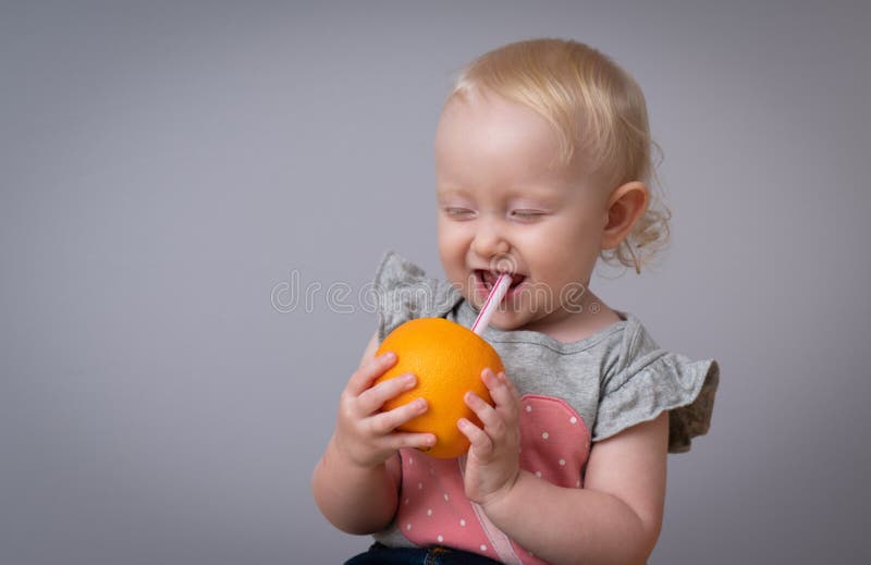 Happy Kid Drinking Fruit Juice . Stock Photo - Image of juice, fruit ...