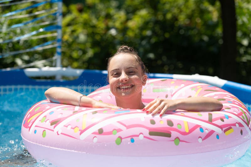 Happy Kid Enjoy Swimming in Donut Pool Float on Sunny Day, Summer Stock ...