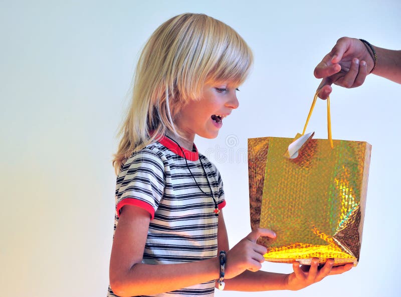 Happy kid getting present stock image. Image of happy - 117430961