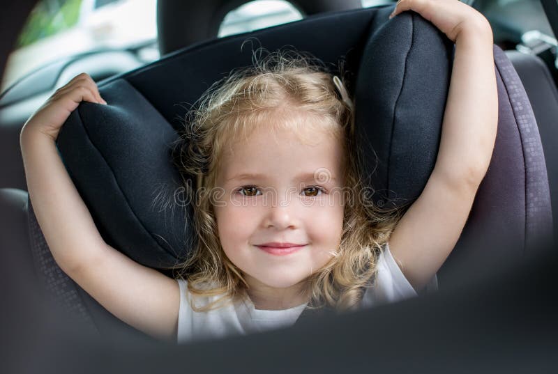 Happy kid girl in the car stock image. Image of relax - 45828345