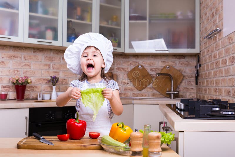 Happy Kid Girl on Kitchen with Fresh Vegetables Stock Photo - Image of ...