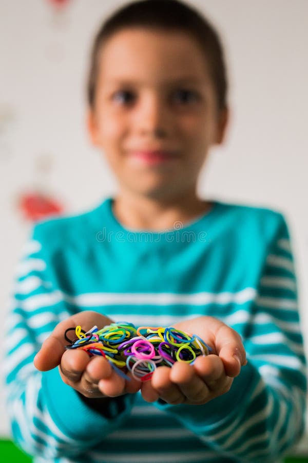 Happy Kid Holding Loom Bands Stock Photo - Image of fashionable, beads ...