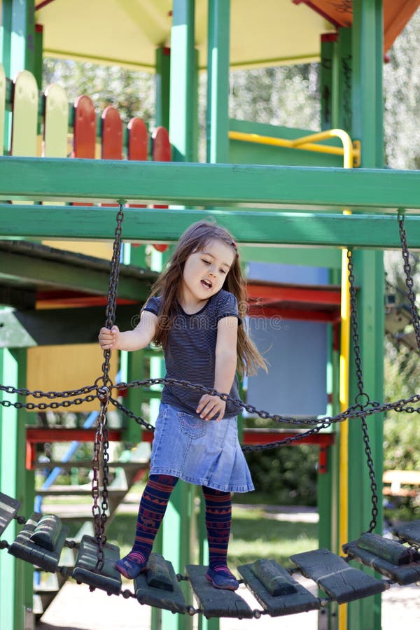 Happy kid on playground stock photo. Image of playground - 20814872