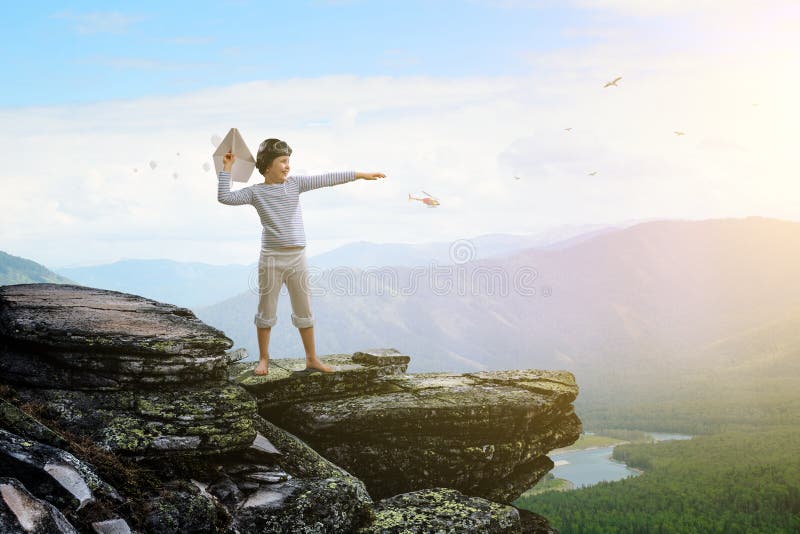 Happy Kid Playing with Paper Airplane . Mixed Media Stock Photo - Image ...