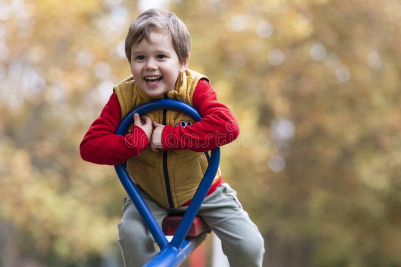 Happy Kid Playing,playground,boy Stock Photo - Image of toddler, cute ...