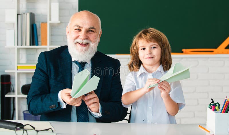 Happy Kid in School. Teacher Help To Learn Stock Image - Image of ...