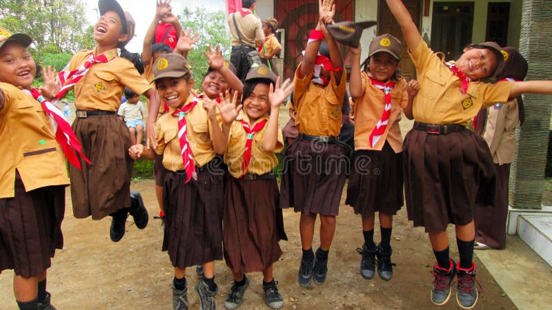 Happy kid scout jump editorial image. Image of ride, long - 52774290