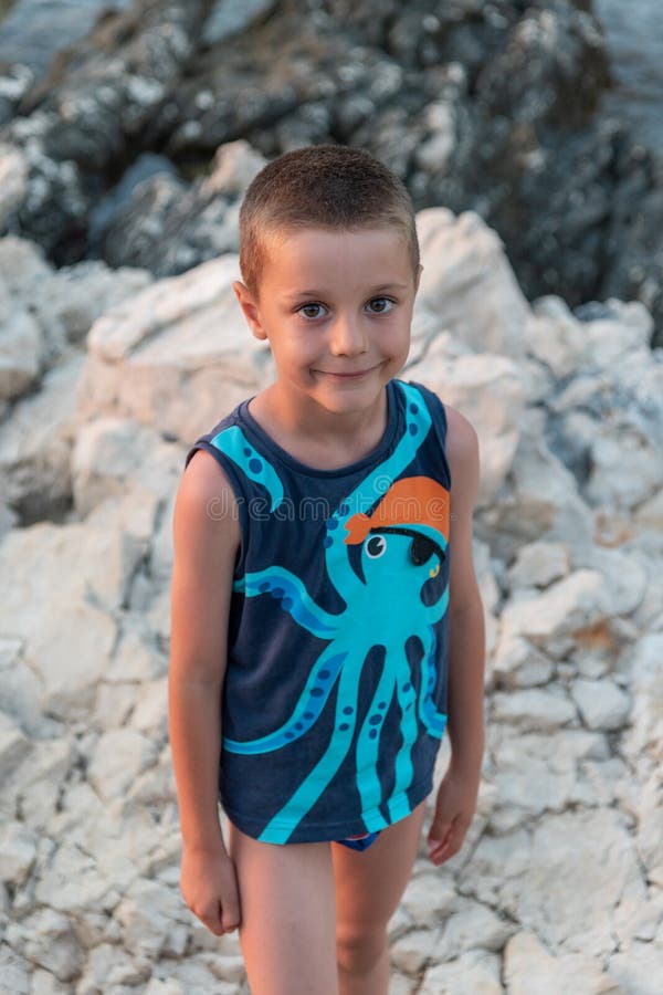 Happy Kid Standing on the Cliff Stock Image - Image of cloudscape ...