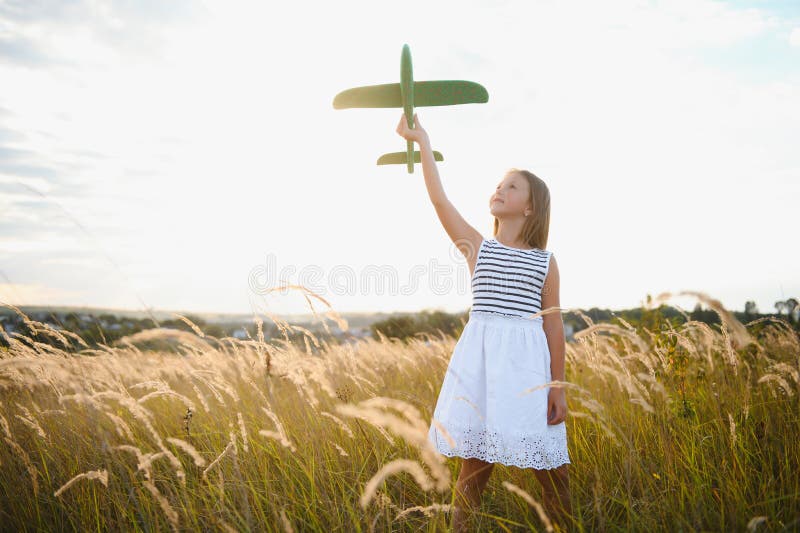 Happy Kid with Toy Plane is Playing at Sunset Stock Image - Image of ...
