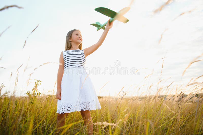 Happy Kid with Toy Plane is Playing at Sunset Stock Image - Image of ...